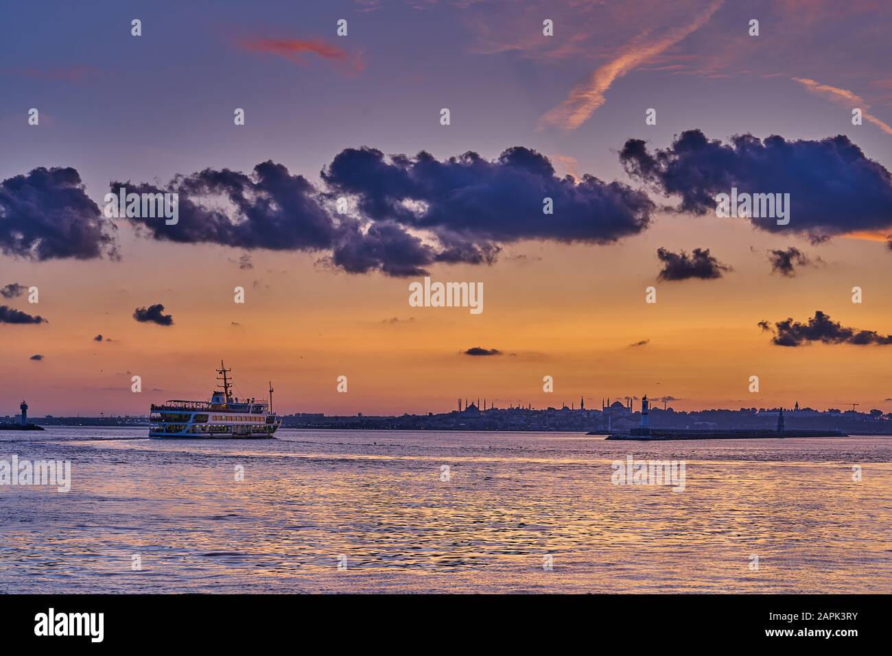 Beautiful sunset in Istanbul, Turkey. Sun is above silhouettes of Hagia ...
