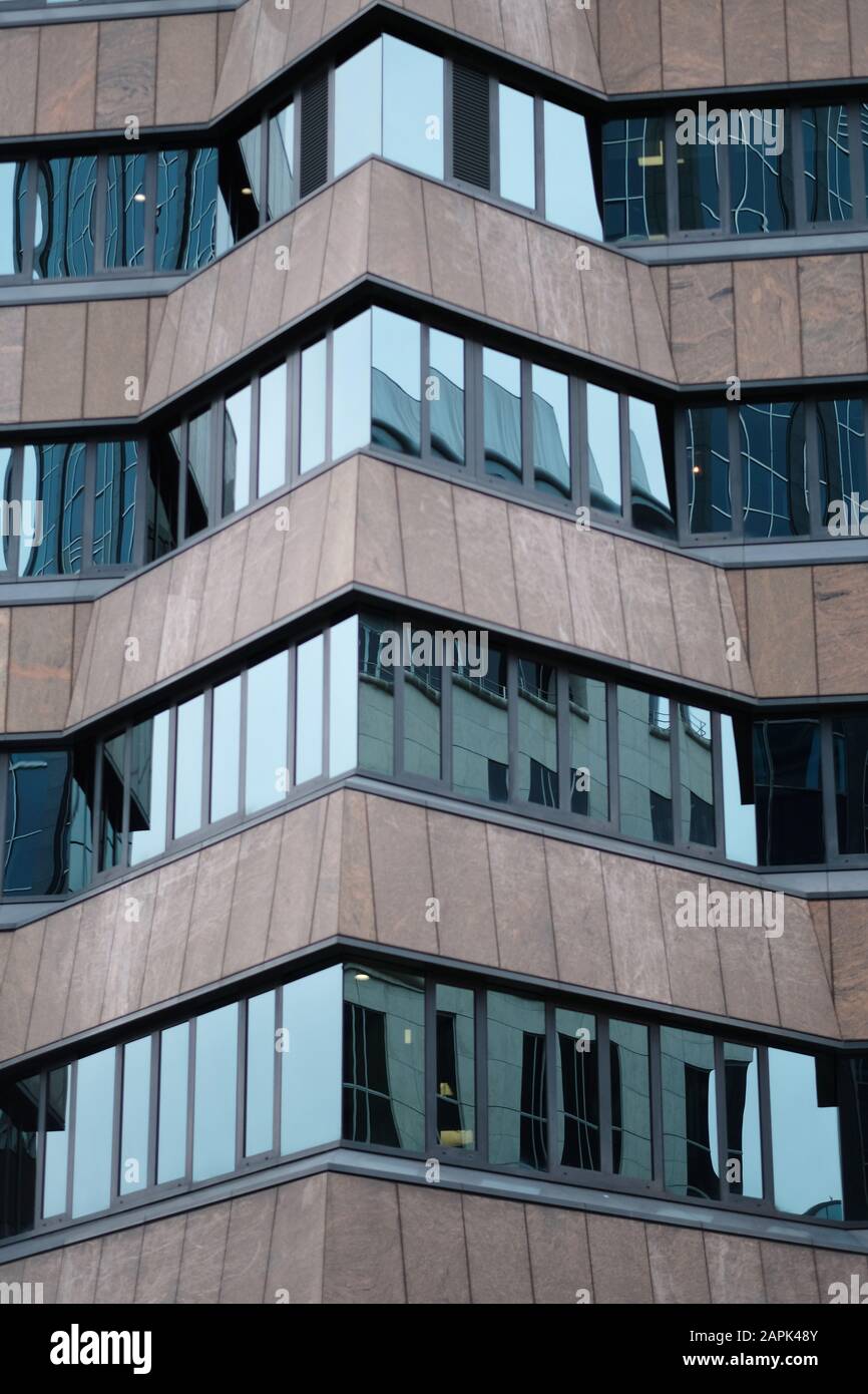 Triangular element of the facade of a modern high-rise building of ...
