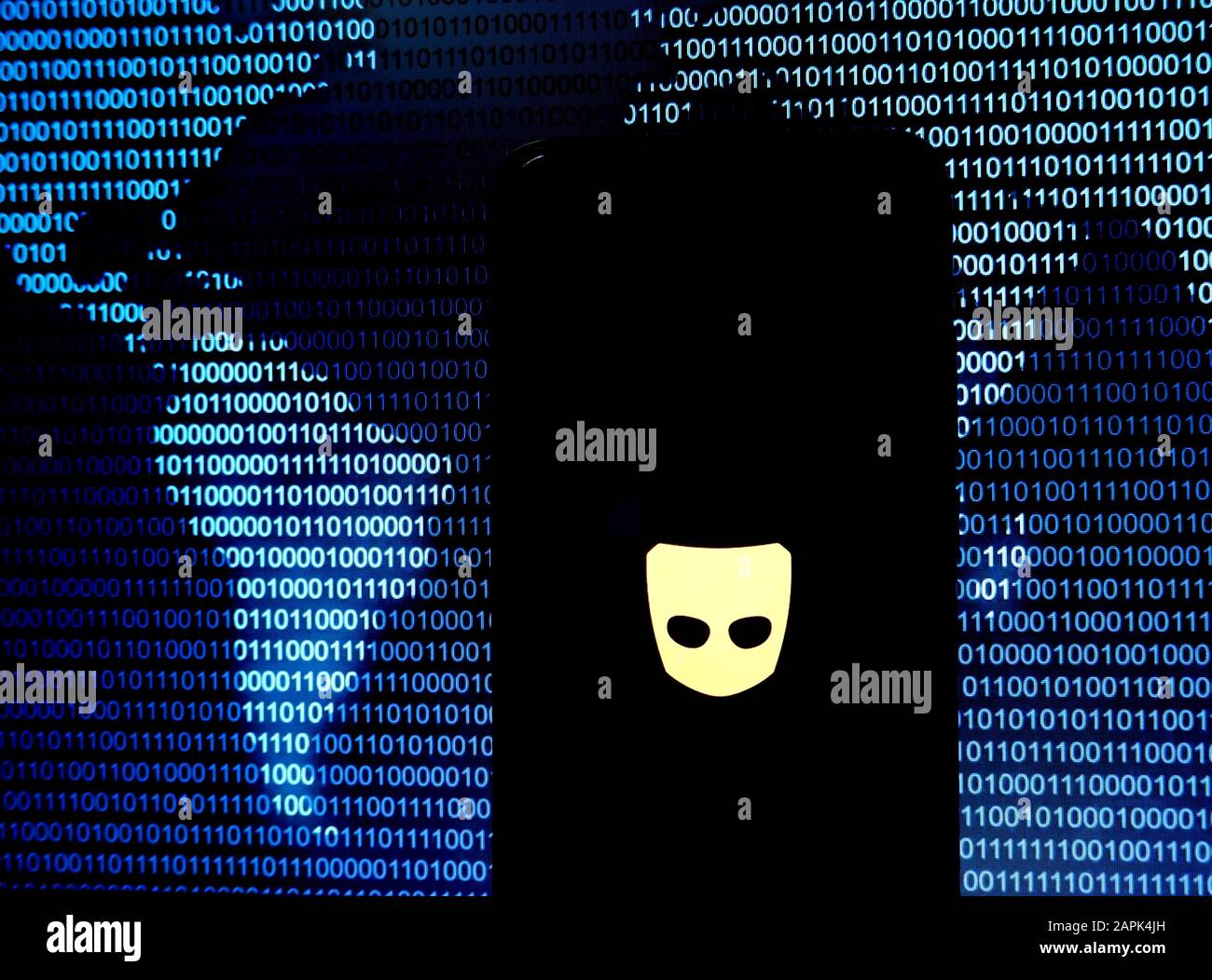 In this photo illustration a social dating application Grindr logo seen ...
