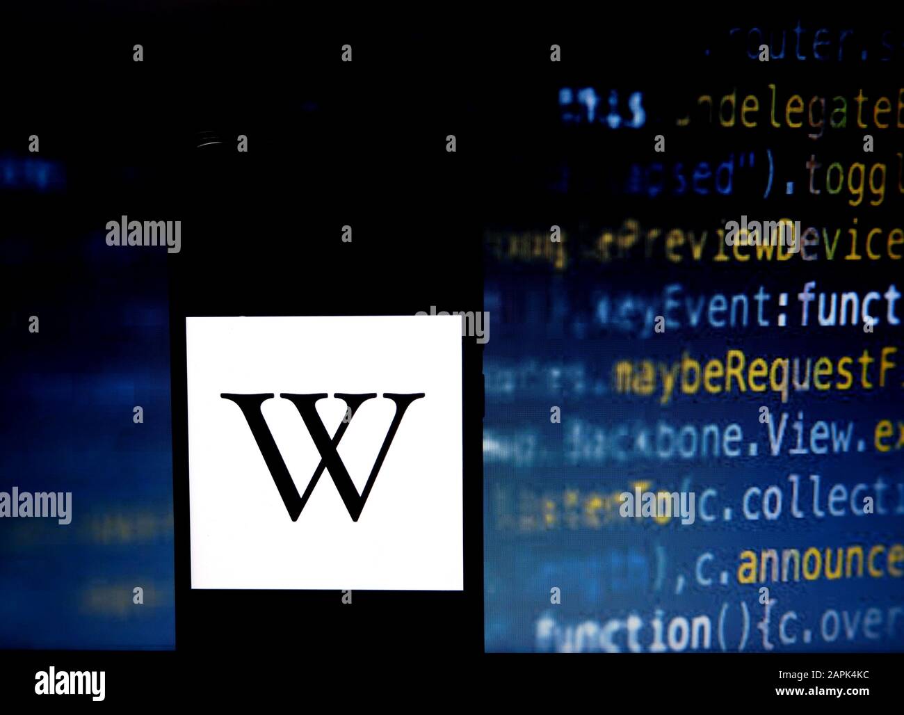 In this photo illustration a Wikipedia logo seen being displayed in a ...