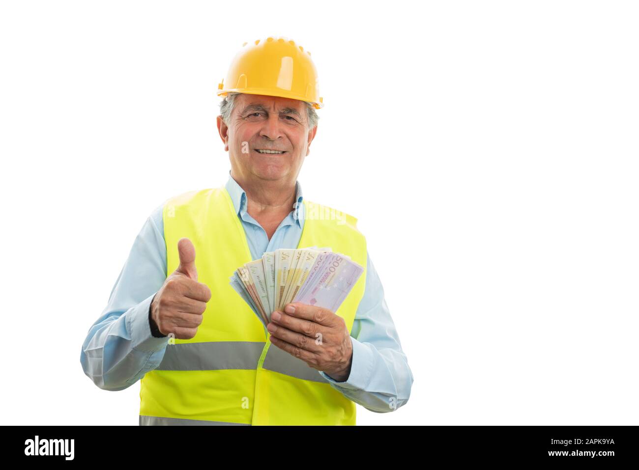Happy old male engineer holding money and showing thumb up as like ...
