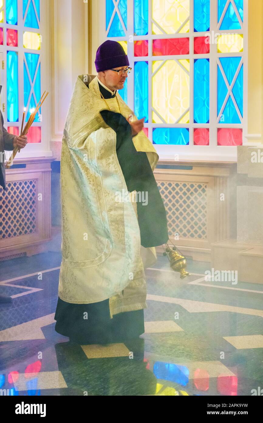 Orthodox priest censes with thurible in the landmark Ascension ...