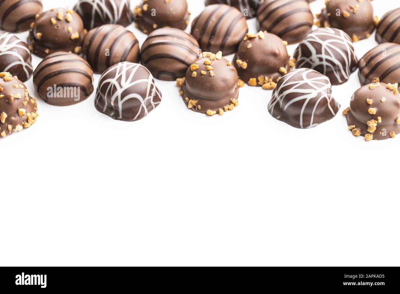 Praline bonbons. Chocolate truffles isolated on white background Stock ...