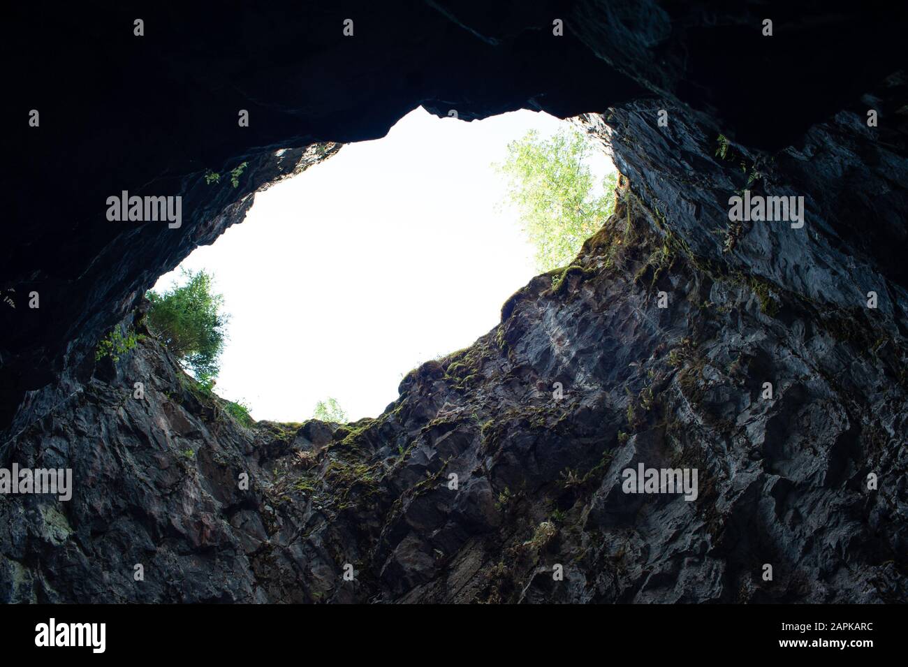 Hole in the rocky cave inside from bottom to top upwards Stock Photo ...