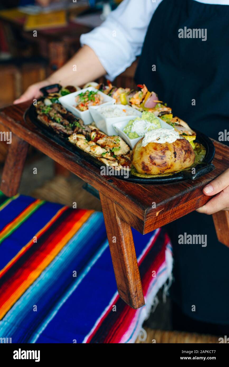 A variety of dishes on a ONE PLATE. Restaurant serving. Top view ...
