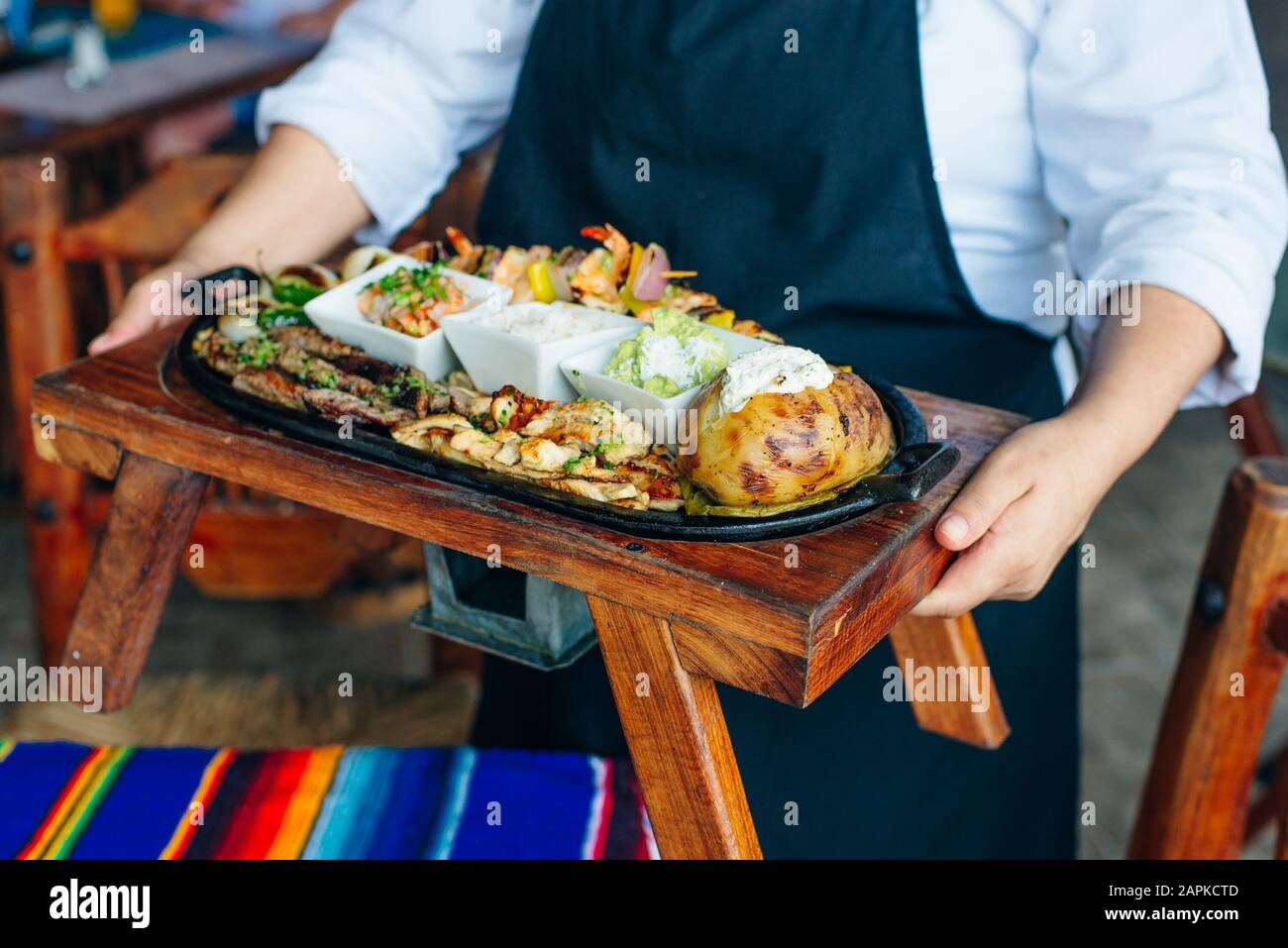 A variety of dishes on a ONE PLATE. Restaurant serving. Top view ...