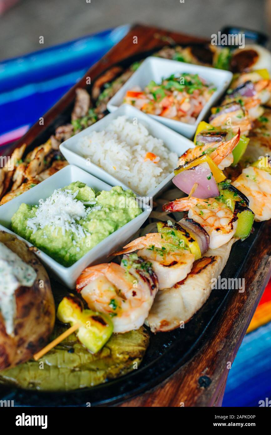 A variety of dishes on a ONE PLATE. Restaurant serving. Top view ...