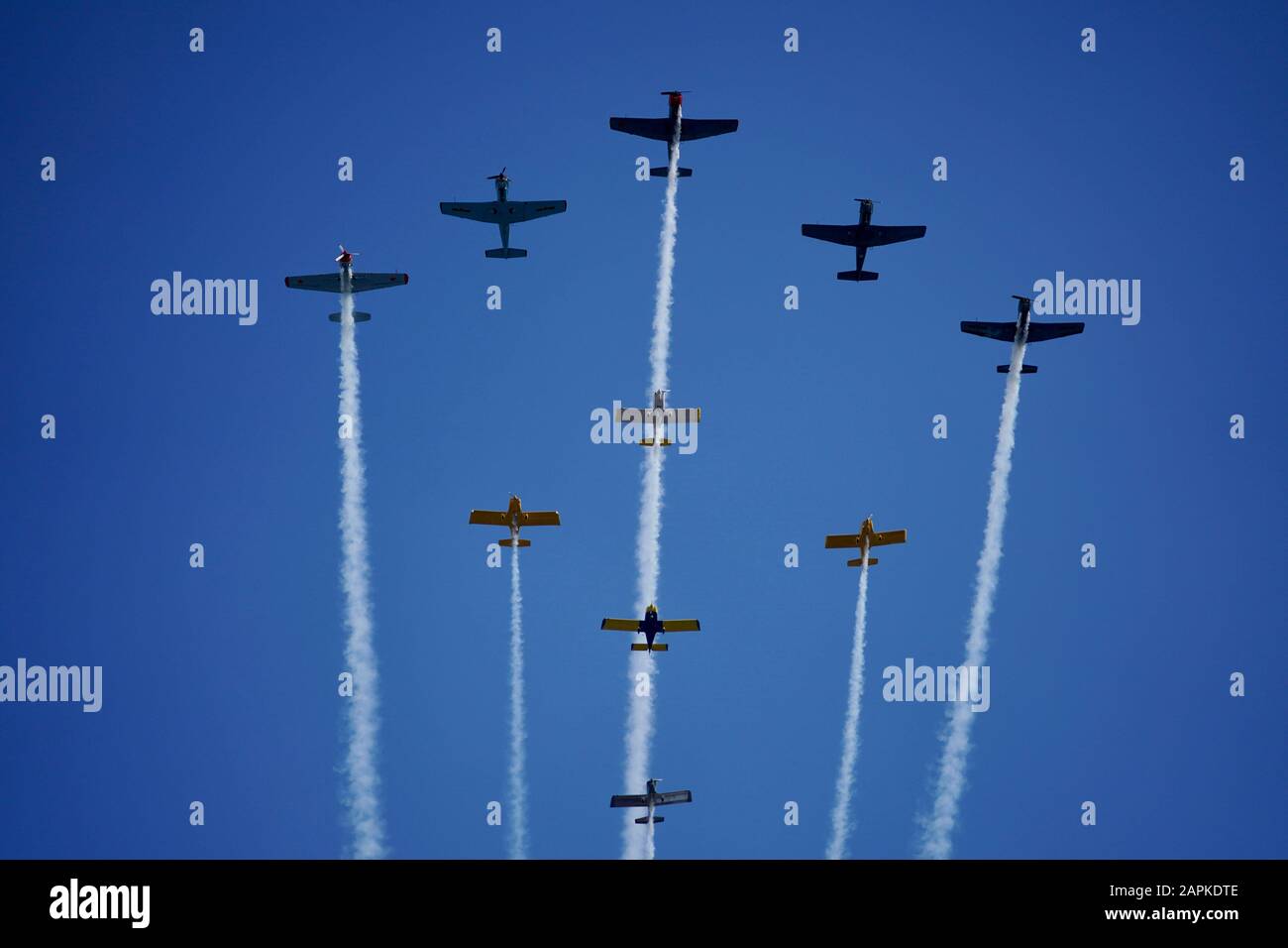 A group of military planes does a fly over a stadium before a game ...