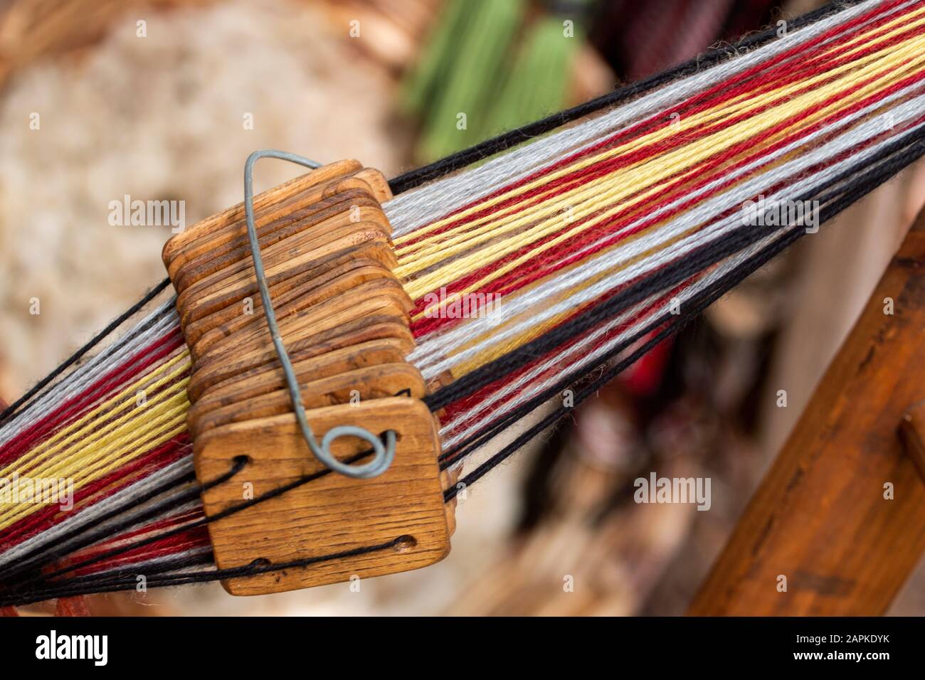 Close up view of traditional sewing knitting tools on a medieval fair ...