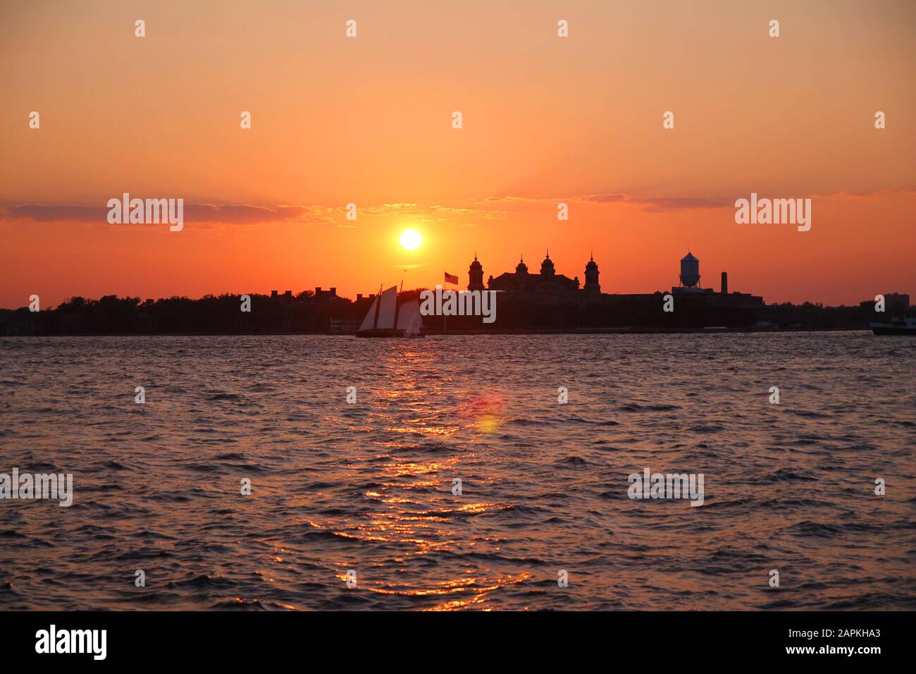 Summer sunset on Ellis Island Stock Photo - Alamy