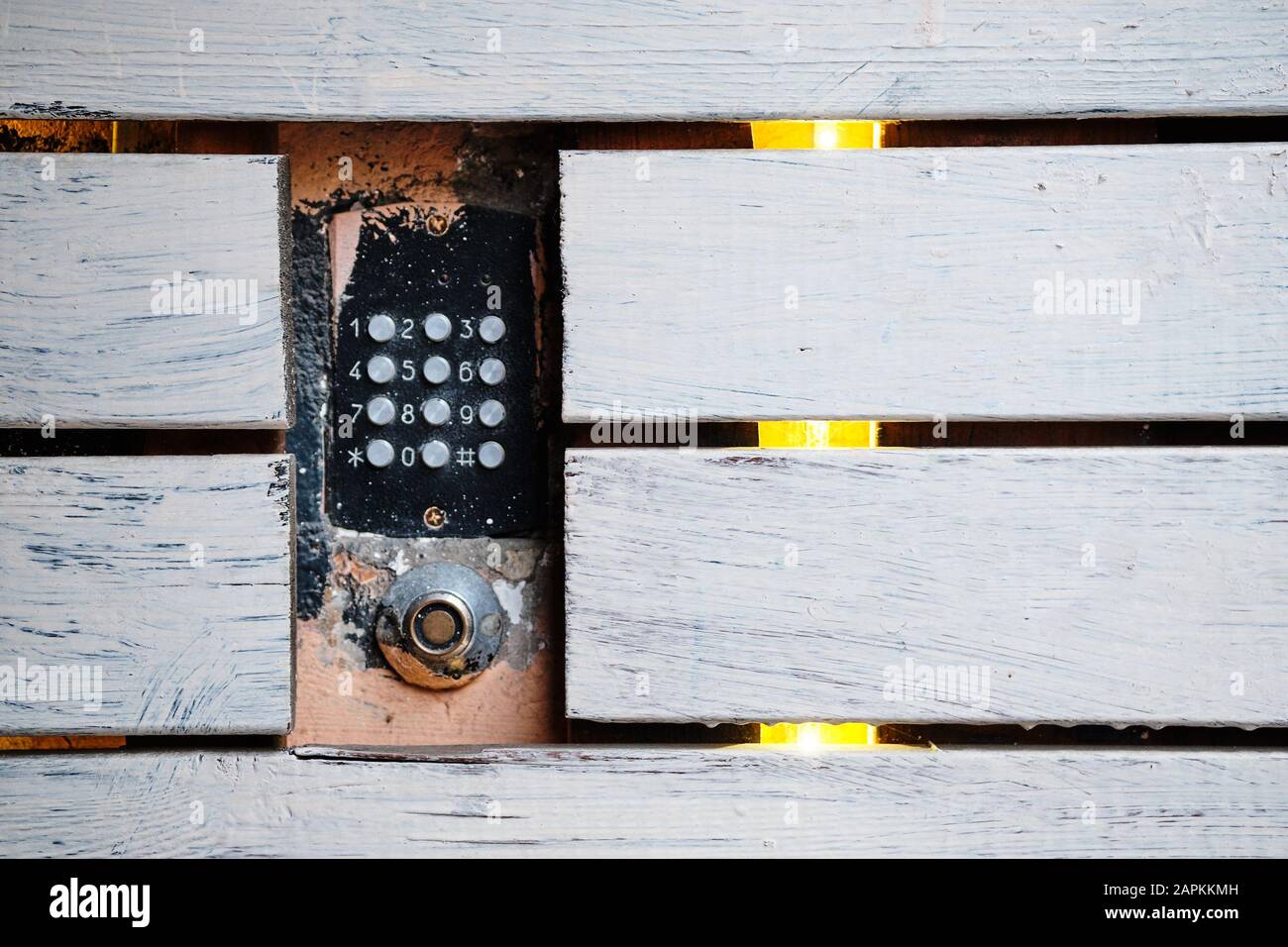 An old intercom with a magnetic key space mounted in the facade. There ...