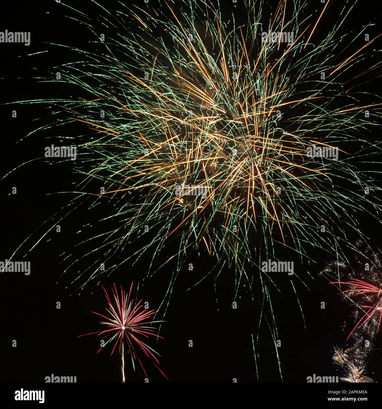 Closeup shot of festive fireworks at a night sky Stock Photo - Alamy