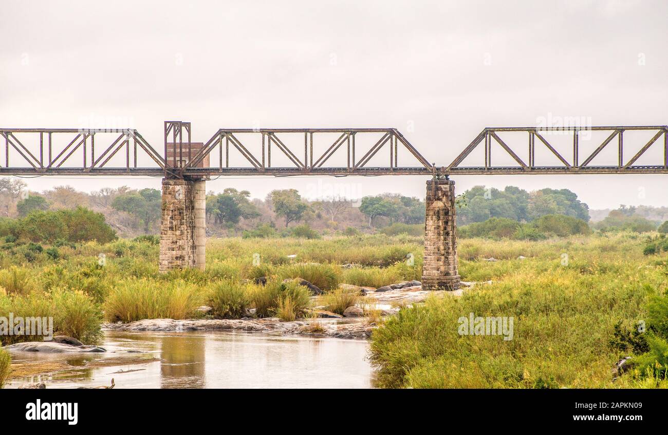 Wide angle shot of a bridge going over the Kruger National Park in ...