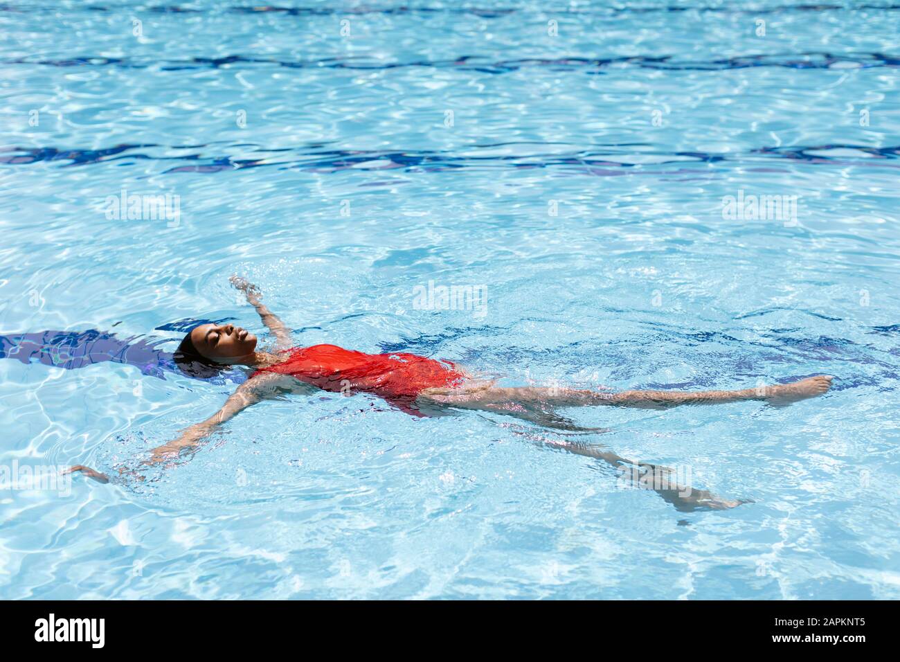 Person laying by the pool hi-res stock photography and images - Alamy