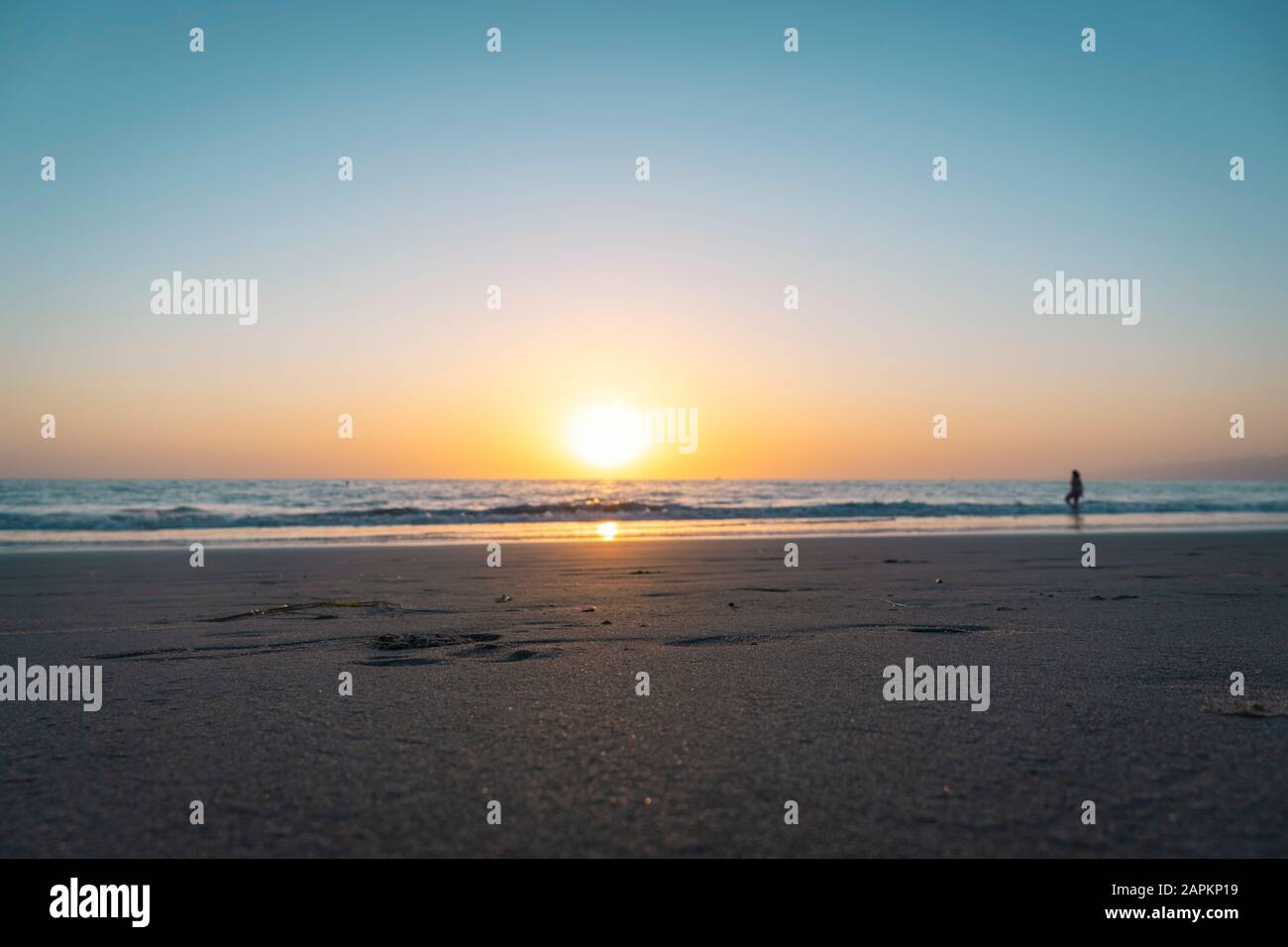 Clear sky over sandy coastal beach pacific ocean sunset hi-res stock ...
