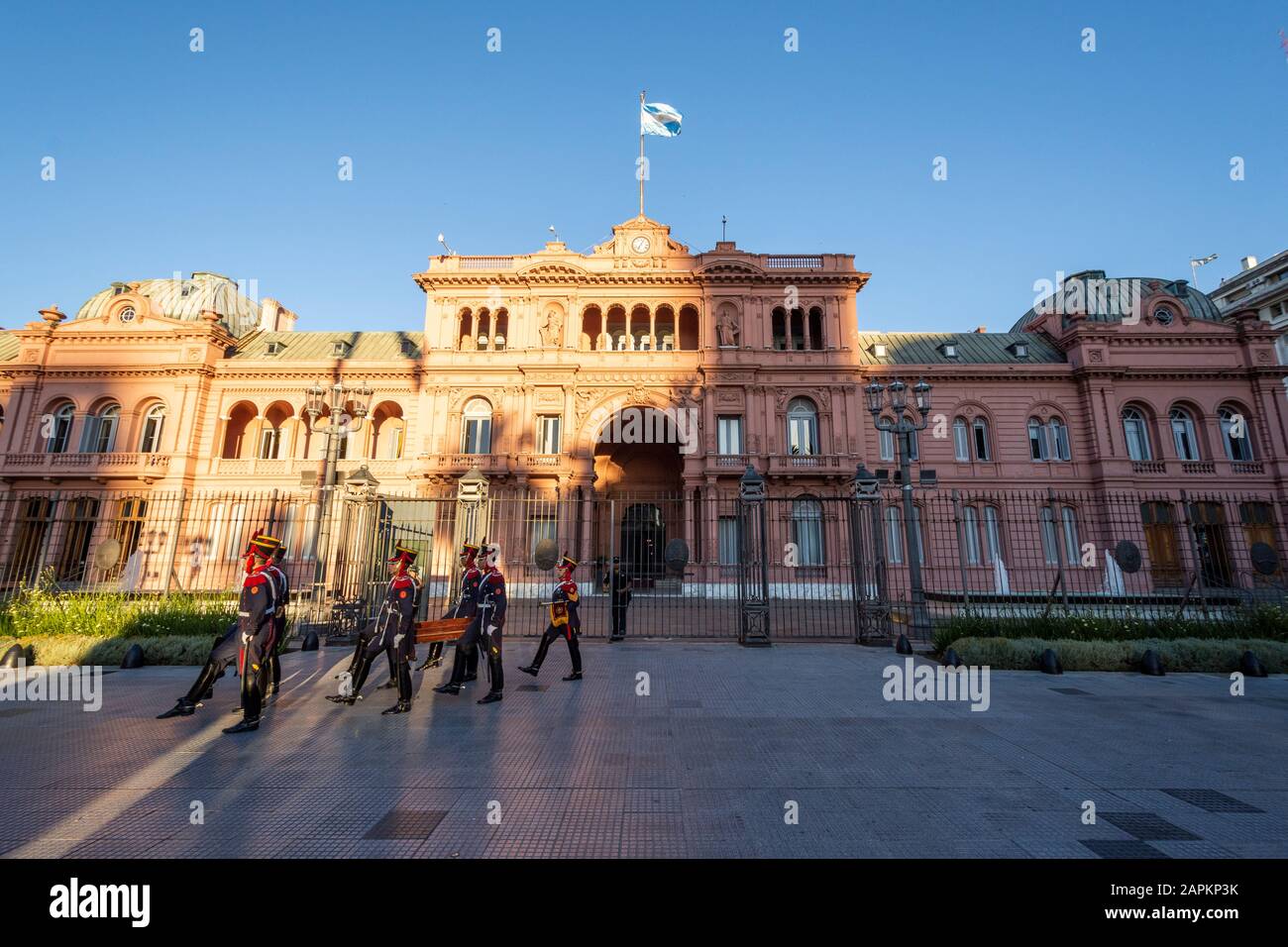 Granadero soldiers lowering the flag in front of Casa Rosada ...