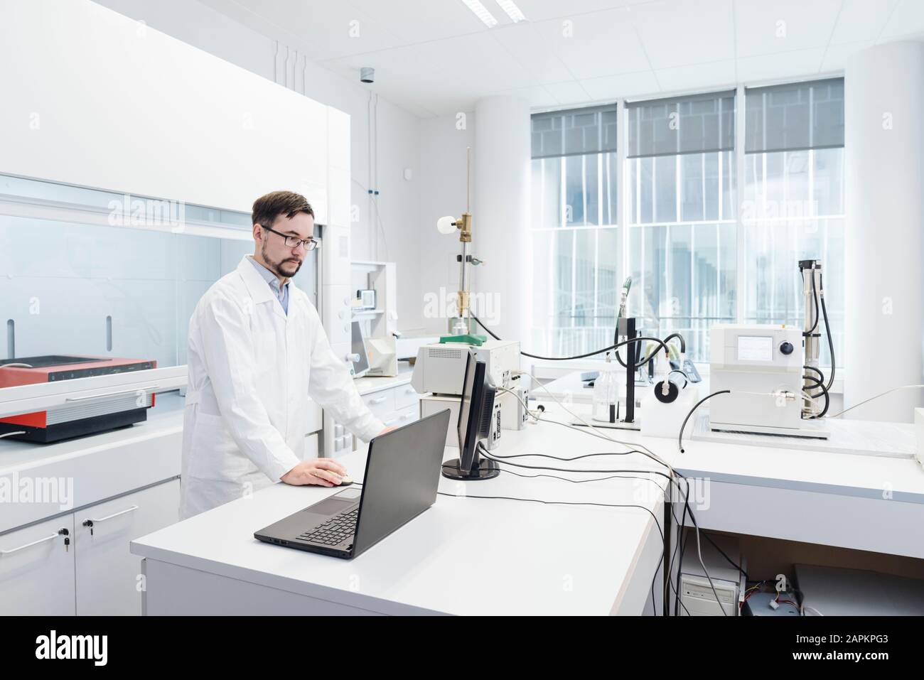 Scientist using computer in laboratory of technology center Stock Photo ...