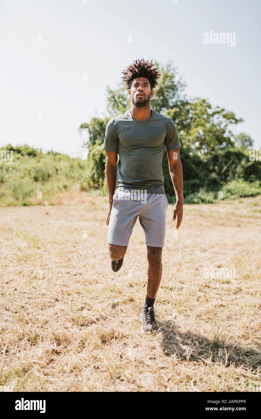 Photo young sportsman standing hi-res stock photography and images - Alamy