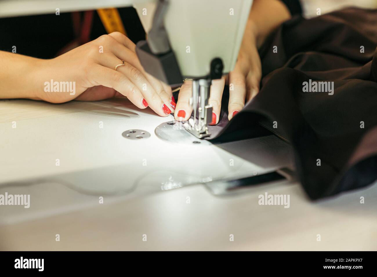 Close up young designer using hi-res stock photography and images - Alamy