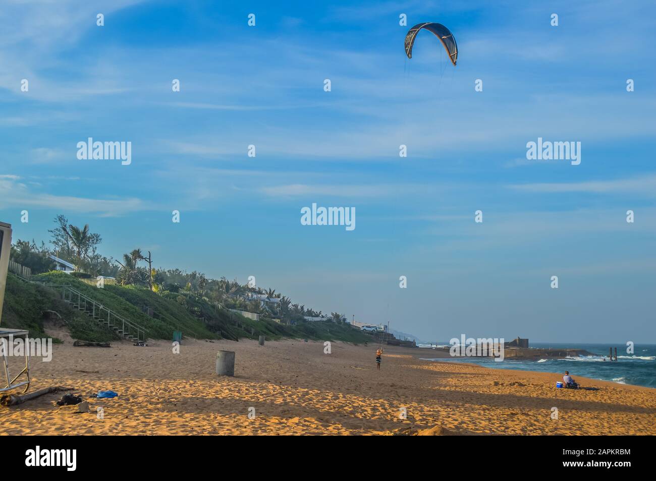 Kite or parchute surfer doing adrenalin rush in Salt rock main beach in ...