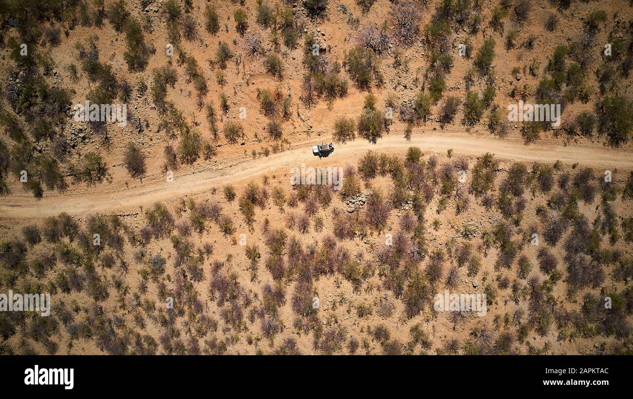 Aerial view of jeep on dirt track, Opuwo, Namibia Stock Photo - Alamy