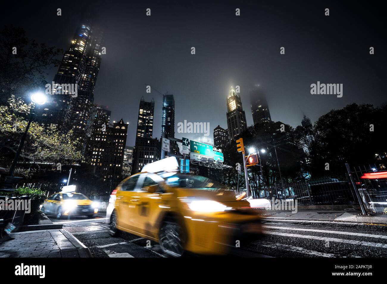 USA, New York, Yellow cab on street at night Stock Photo - Alamy