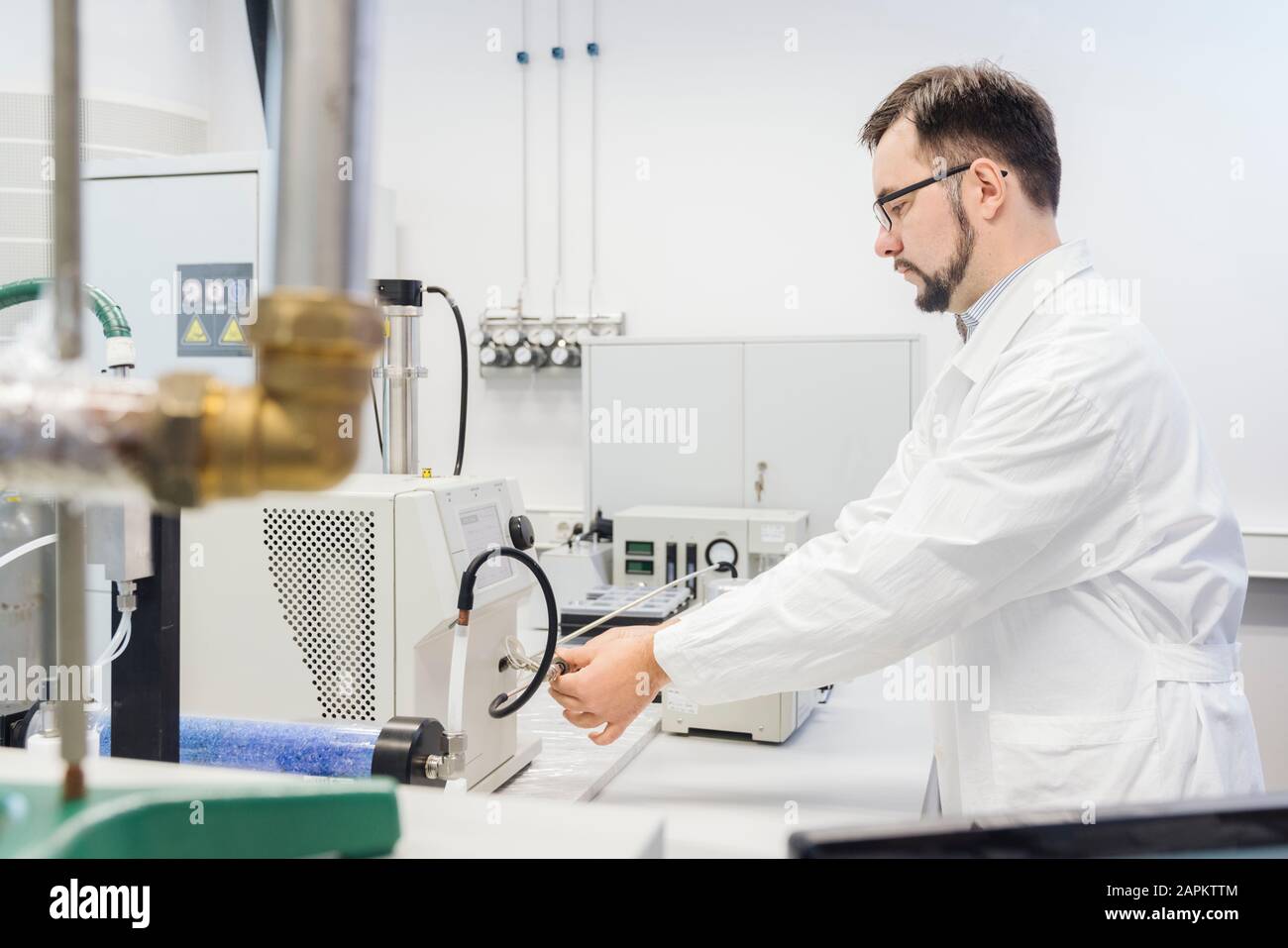 Researcher working in laboratory of technology center Stock Photo - Alamy