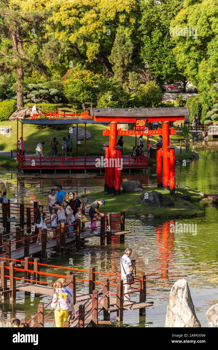 Beautiful view to red gate and bridge over lake in Japanese Gardens ...