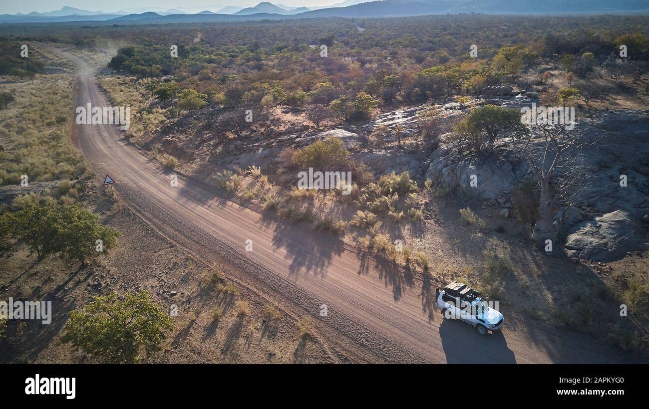 Aerial view of jeep on dirt track, Opuwo, Namibia Stock Photo - Alamy