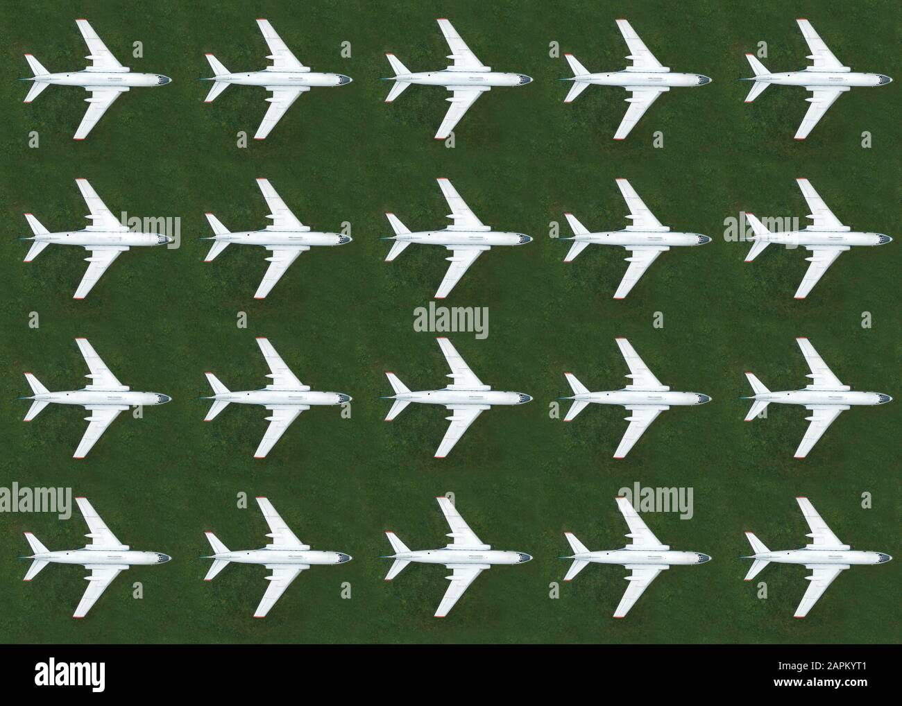 Aerial view of rows of airplanes standing on green grass Stock Photo ...