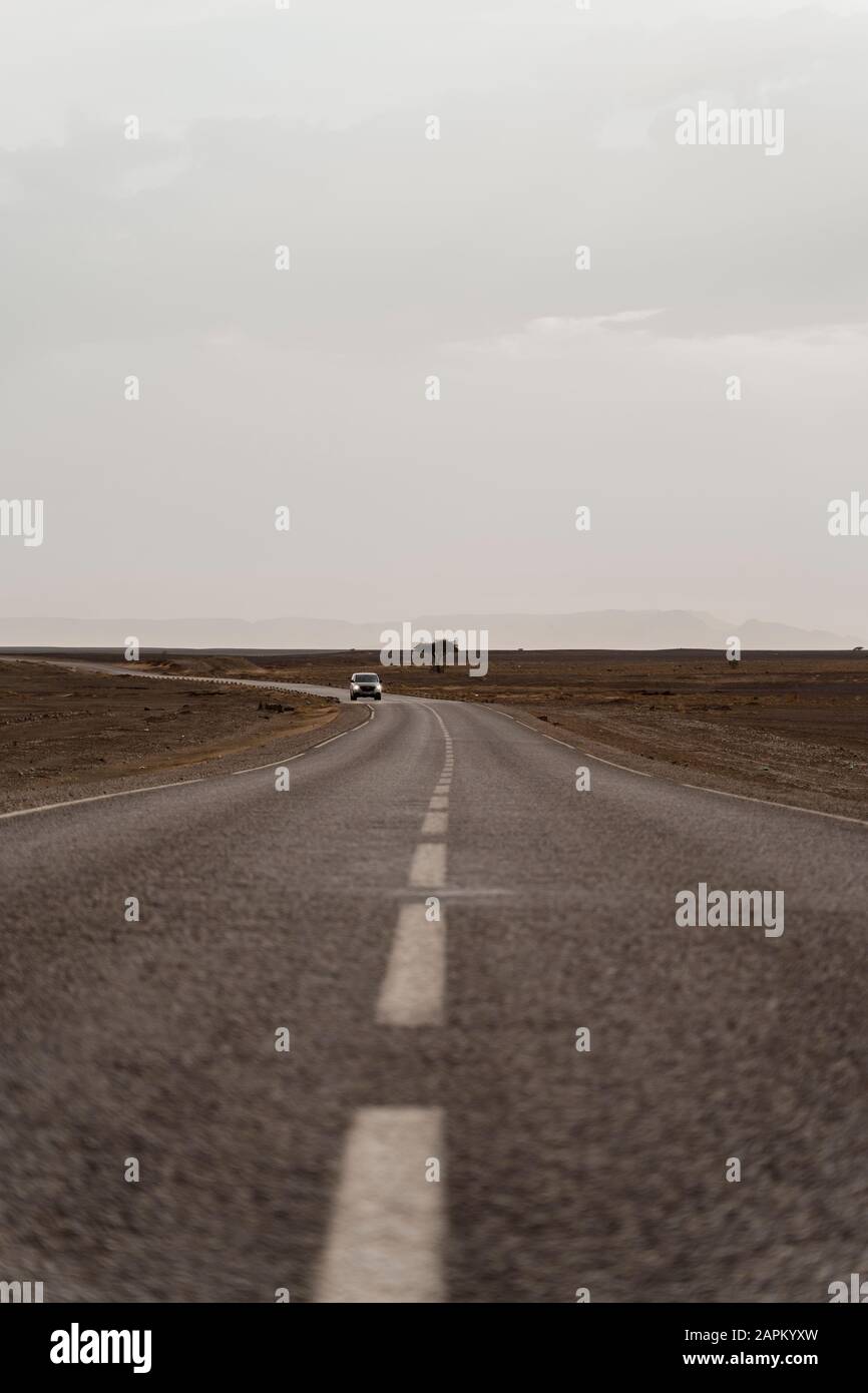 Car driving on country road, Fez, Morocco Stock Photo - Alamy