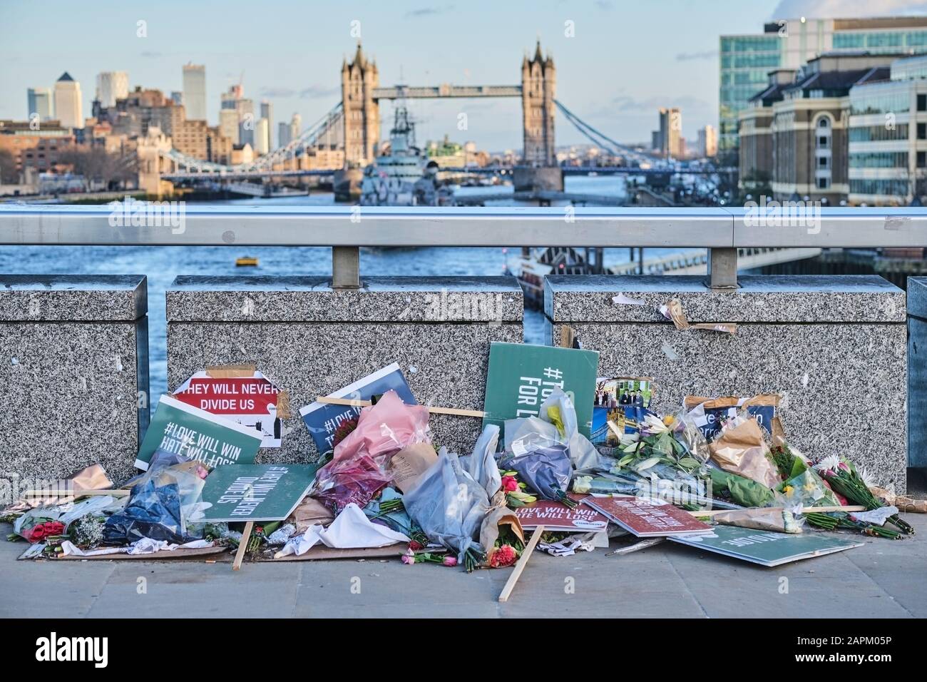 UK, England, London, Garbage lying by outdoor railing with Tower Bridge ...