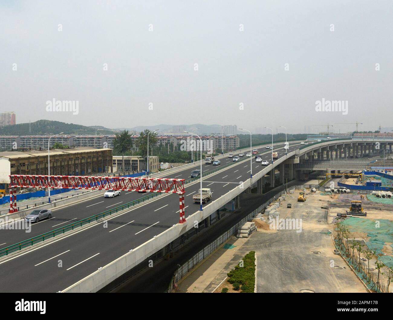 New highway flyover on the outskirts of Jinan, capital city of Shandong ...