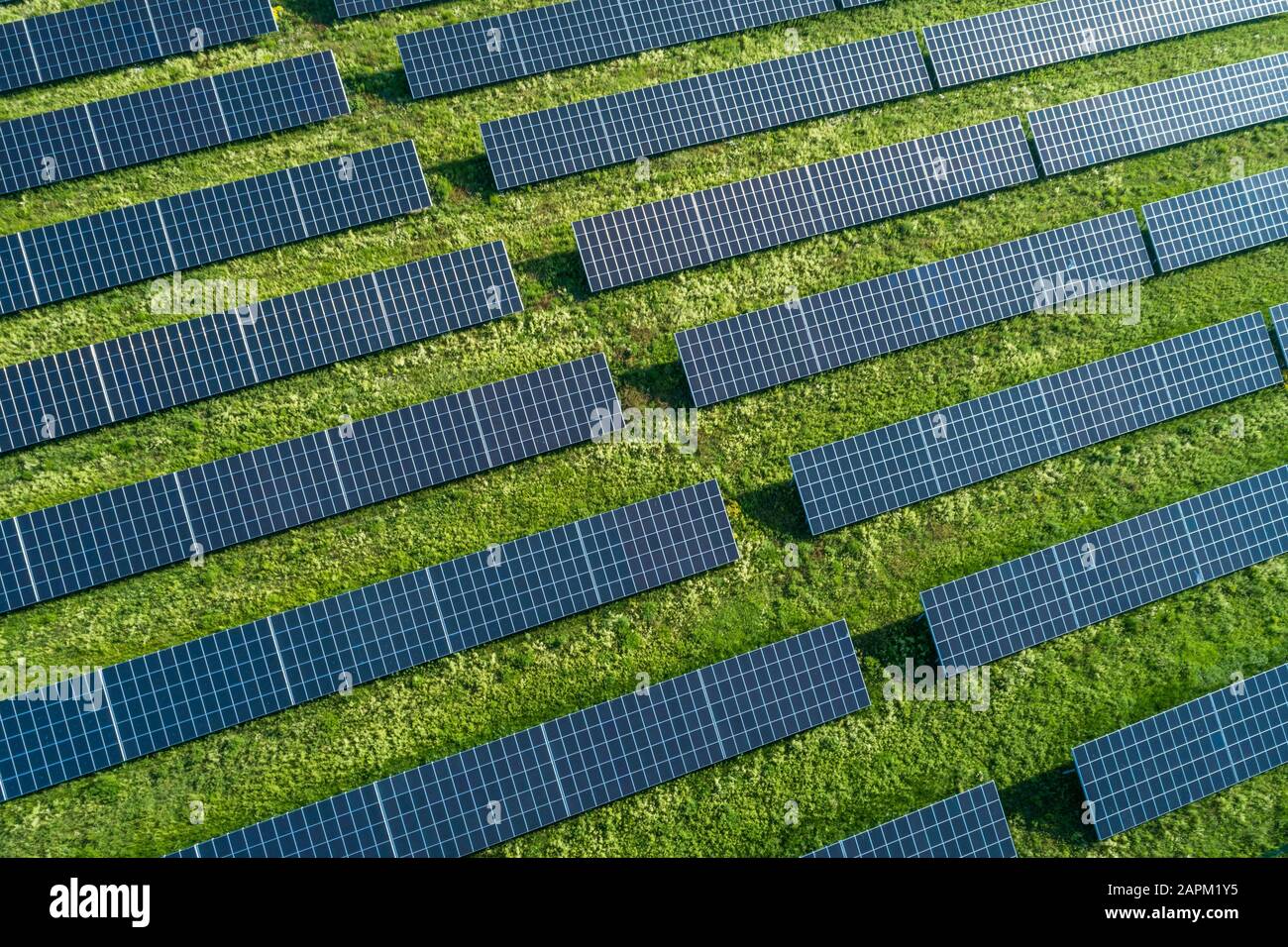 Abstract aerial view of solar panels in solar farm. Bavaria, Germany ...