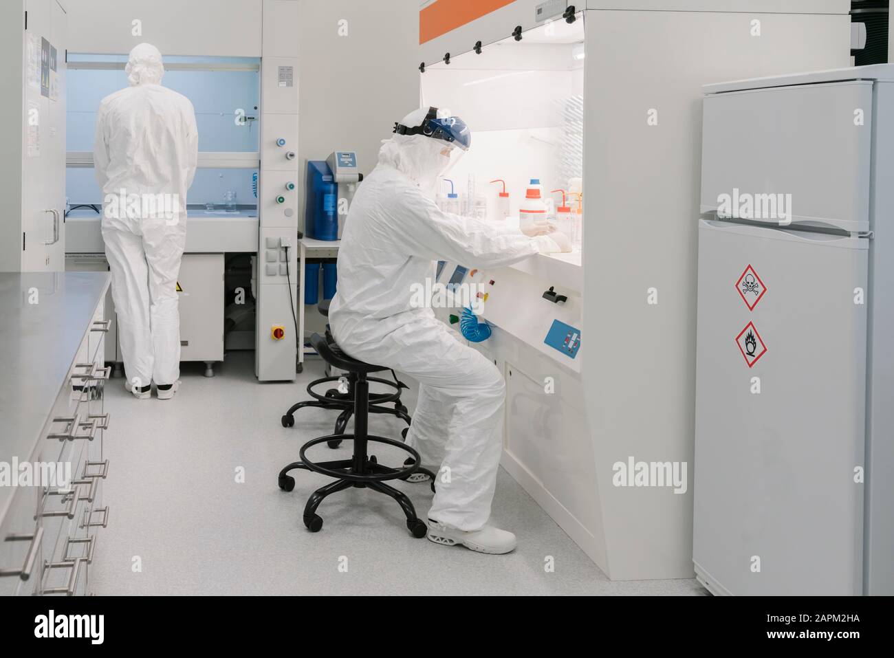 Two scientists working in laboratory Stock Photo - Alamy