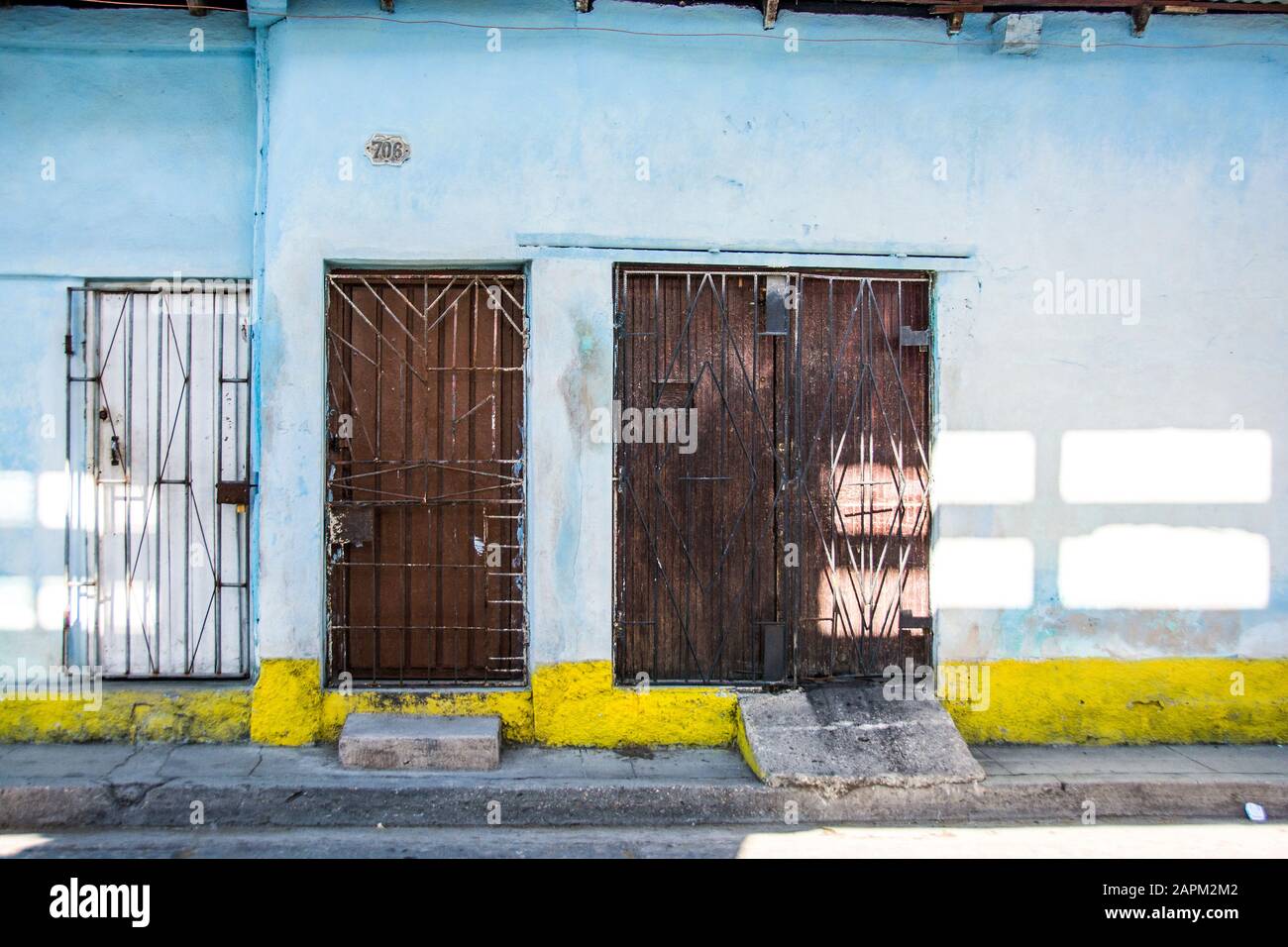 Front facade of a house in a neighborhood in Santiago de Cuba, Cuba ...