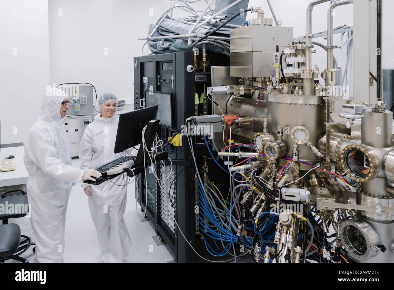 Two scientists using computer in laboratory of science center Stock ...