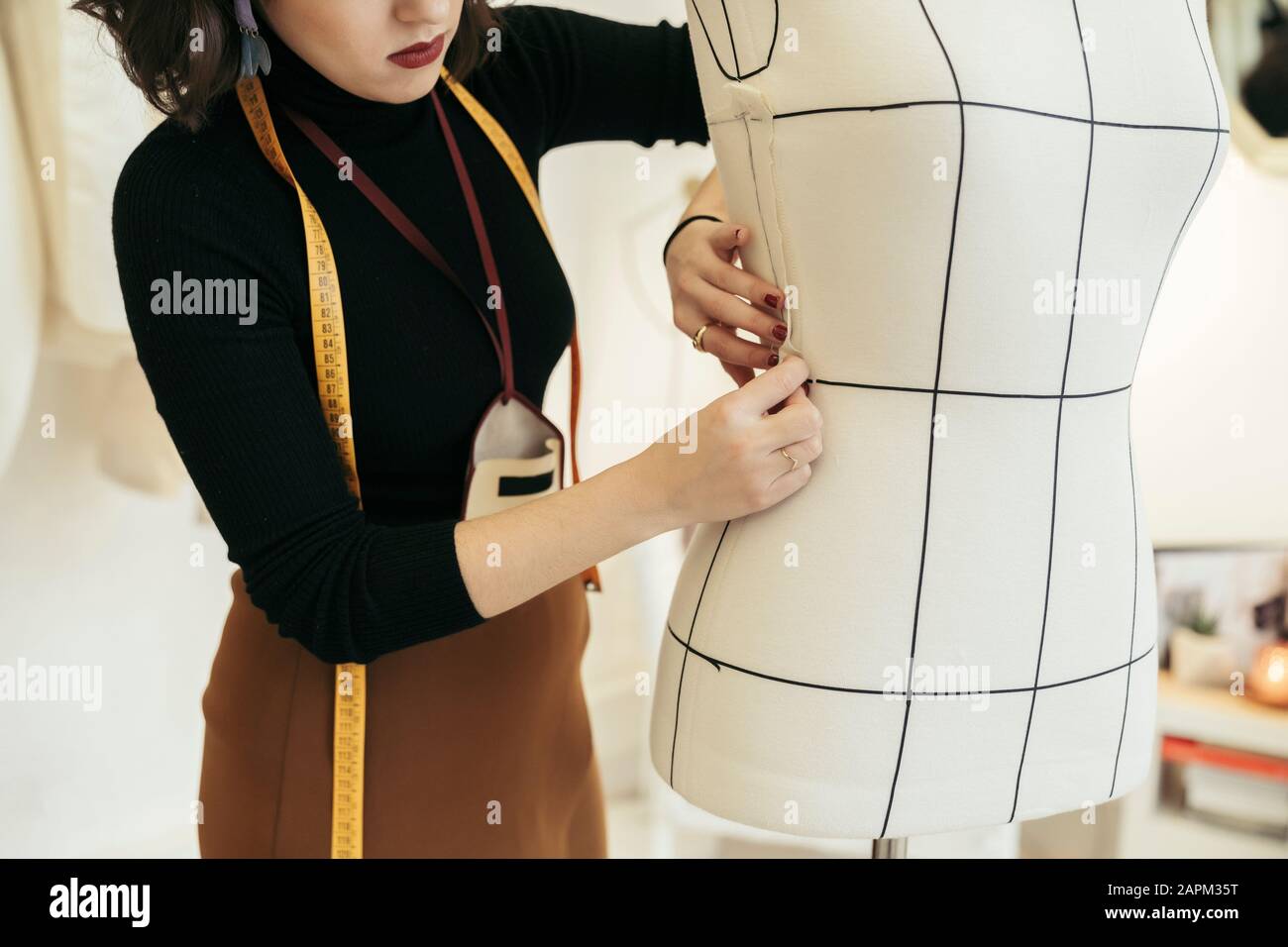 Crop view of fashion designer at work Stock Photo - Alamy