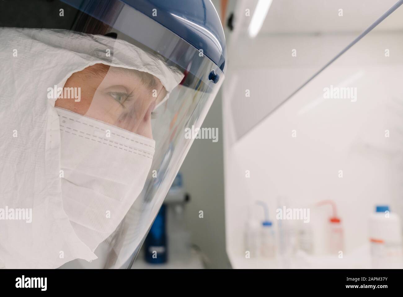Close-up of researcher wearing safety helmet in laboratory Stock Photo ...