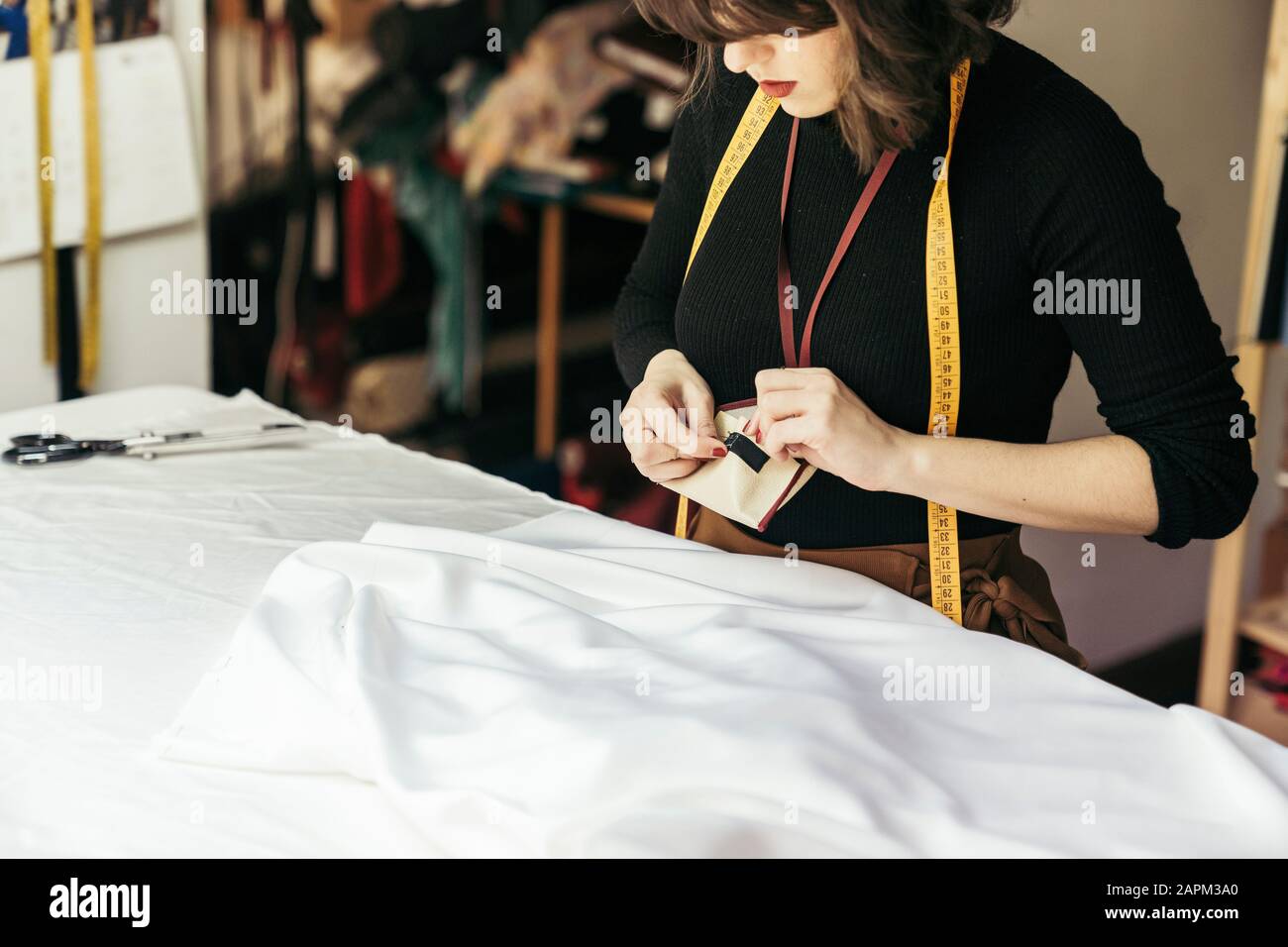 Crop view of fashion designer at work Stock Photo - Alamy