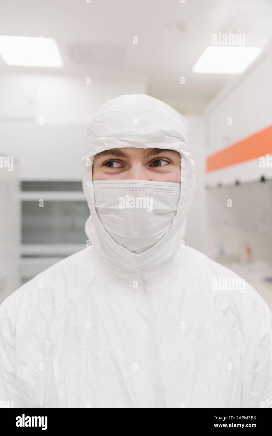 Portrait of scientist wearing protective clothing in laboratory Stock ...