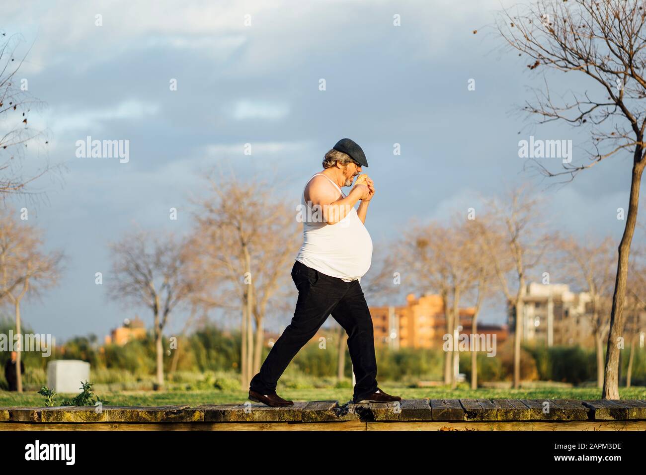 Man with beer belly hi-res stock photography and images - Alamy