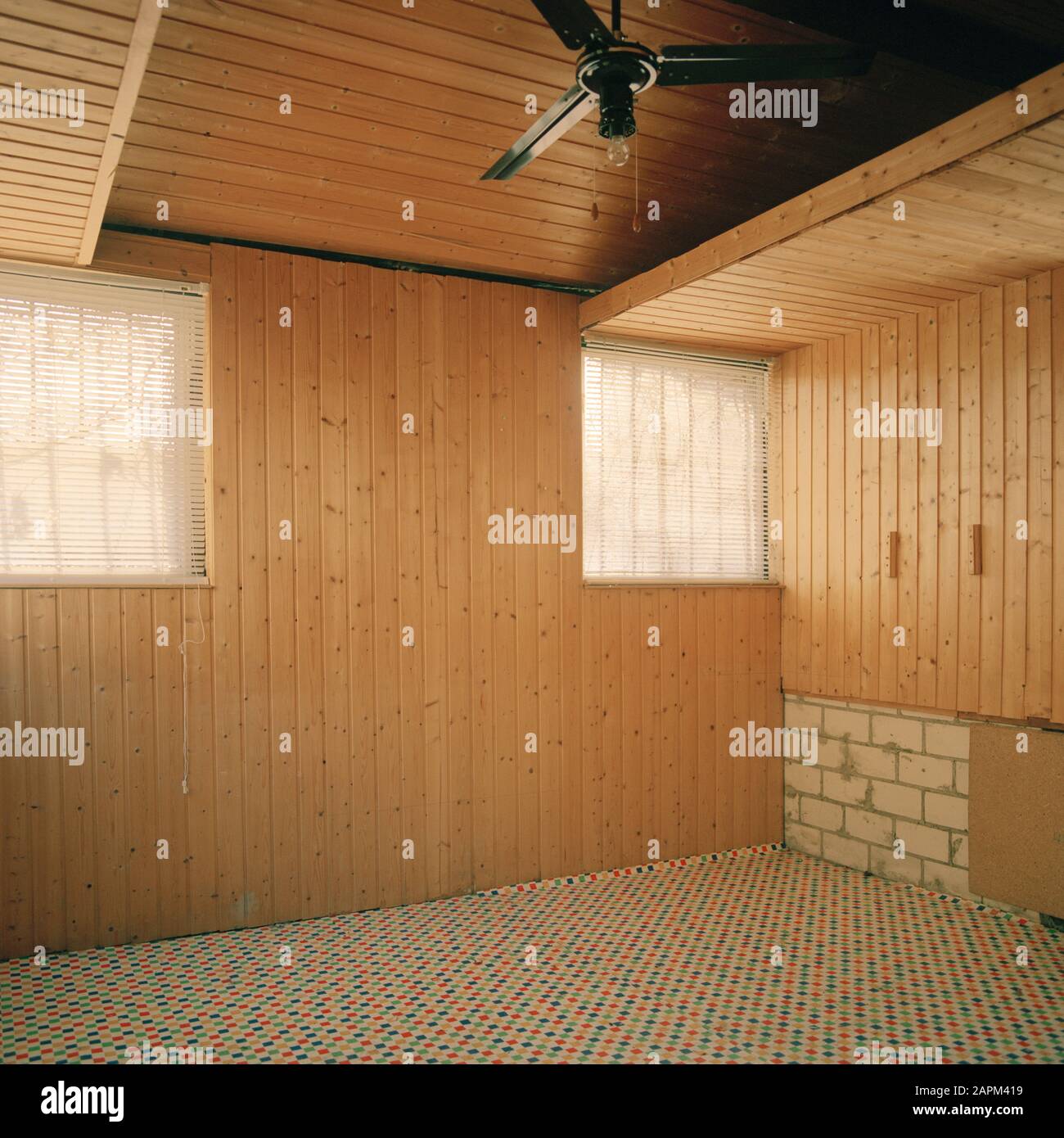 Germany, Berlin, Interior of empty shed with ceiling fan Stock Photo ...