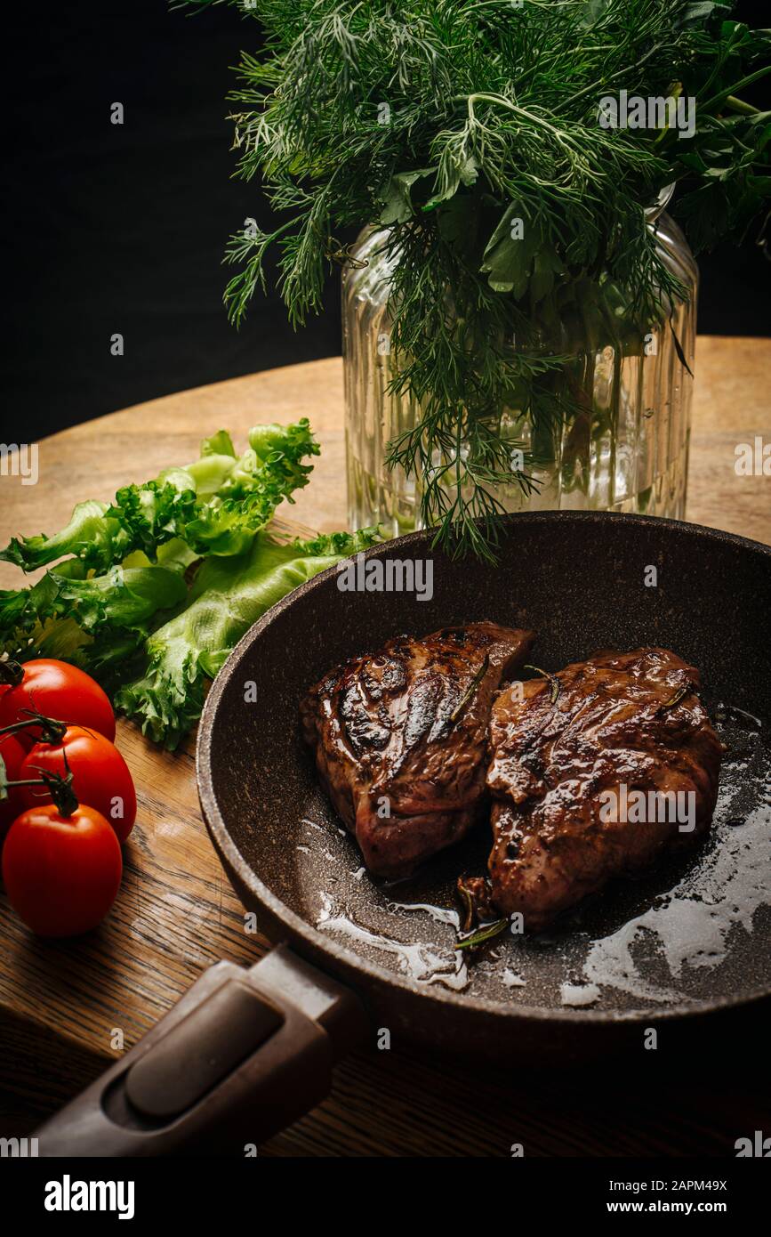 Russia, Saint Petersburg, Fried meat on cooking pan Stock Photo - Alamy