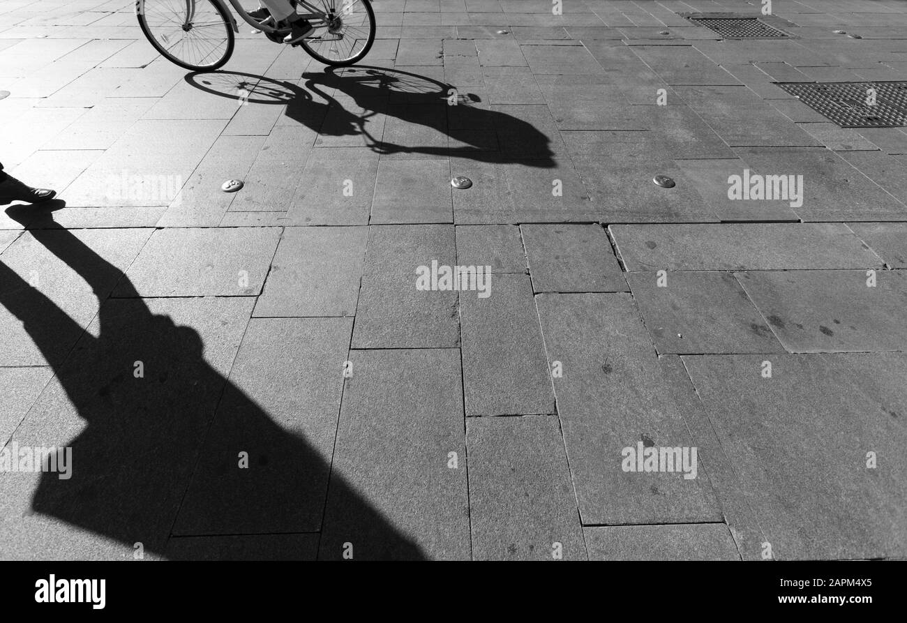 Shades people on pavement Black and White Stock Photos & Images - Alamy