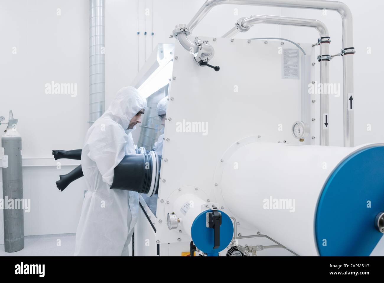 Cleanroom suit hi-res stock photography and images - Alamy