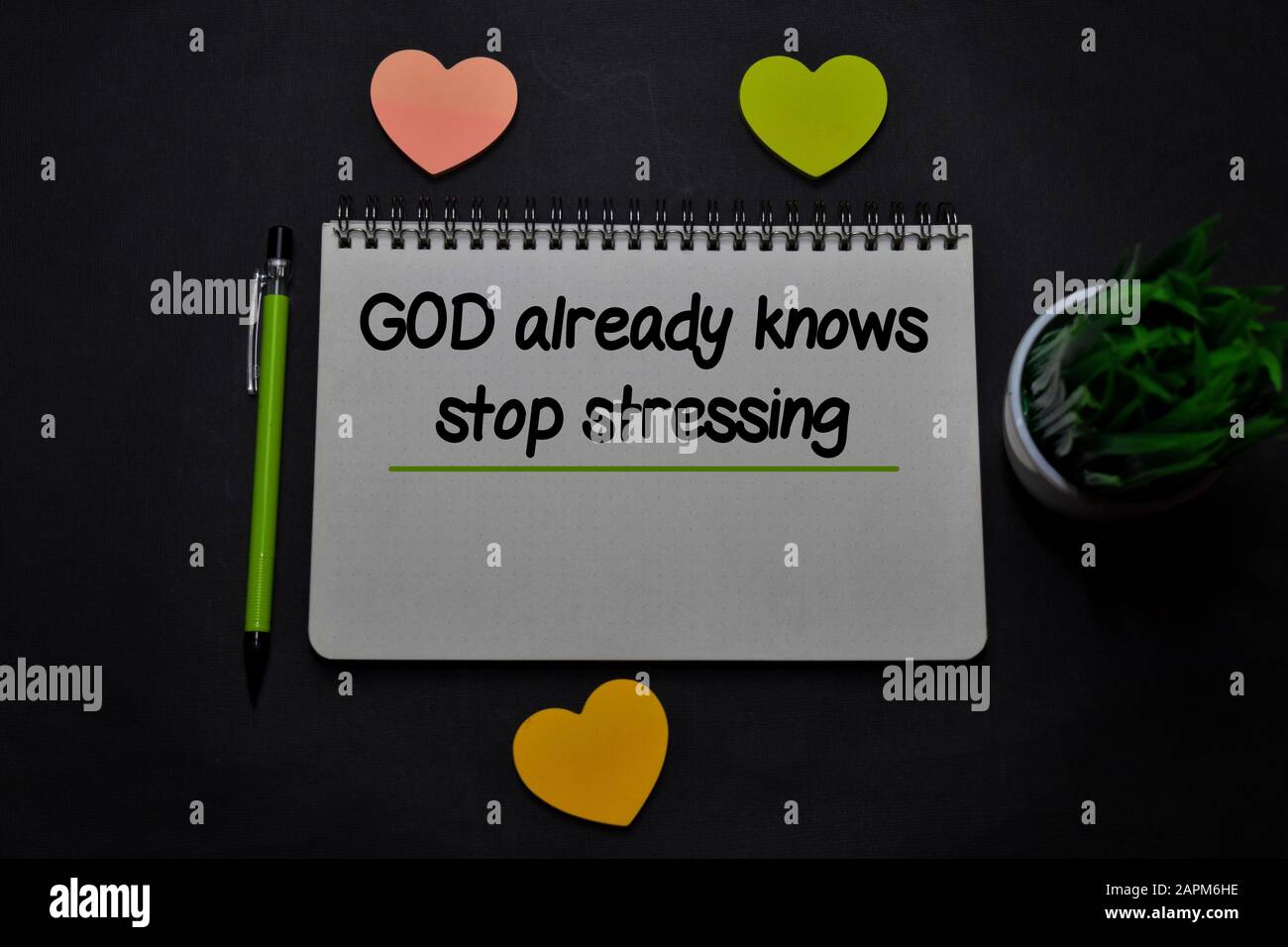 God Already Knows Stop Stressing write on a book isolated on office ...