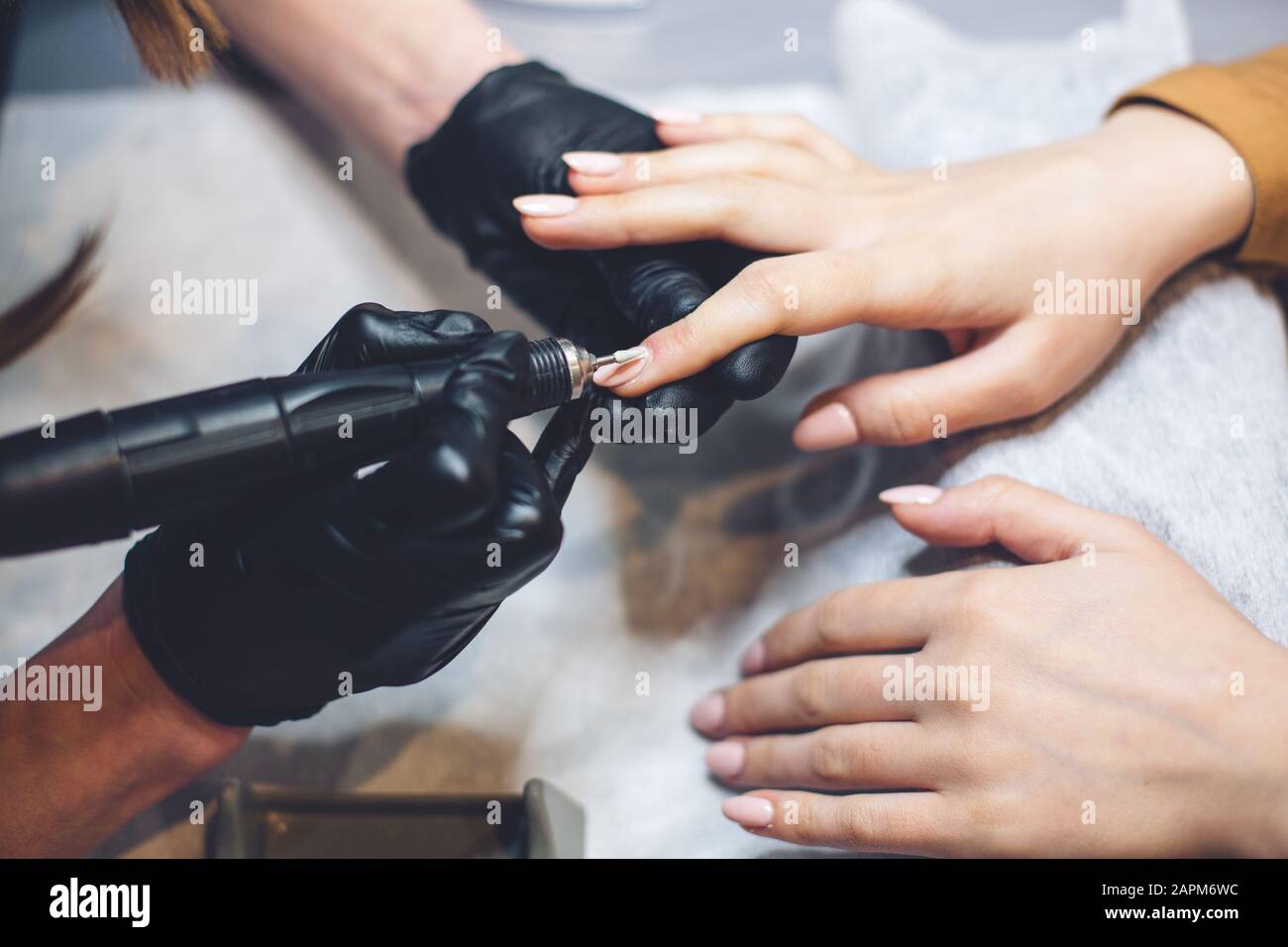 Hand beautician in glove processing hi-res stock photography and images ...