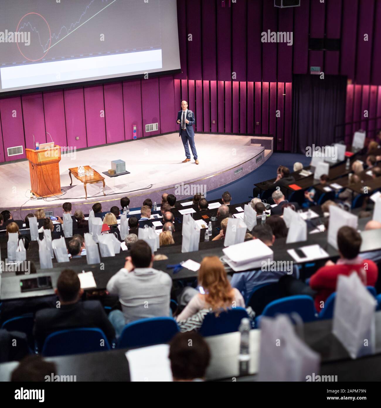 Speaker giving presentation on business conference event Stock Photo ...
