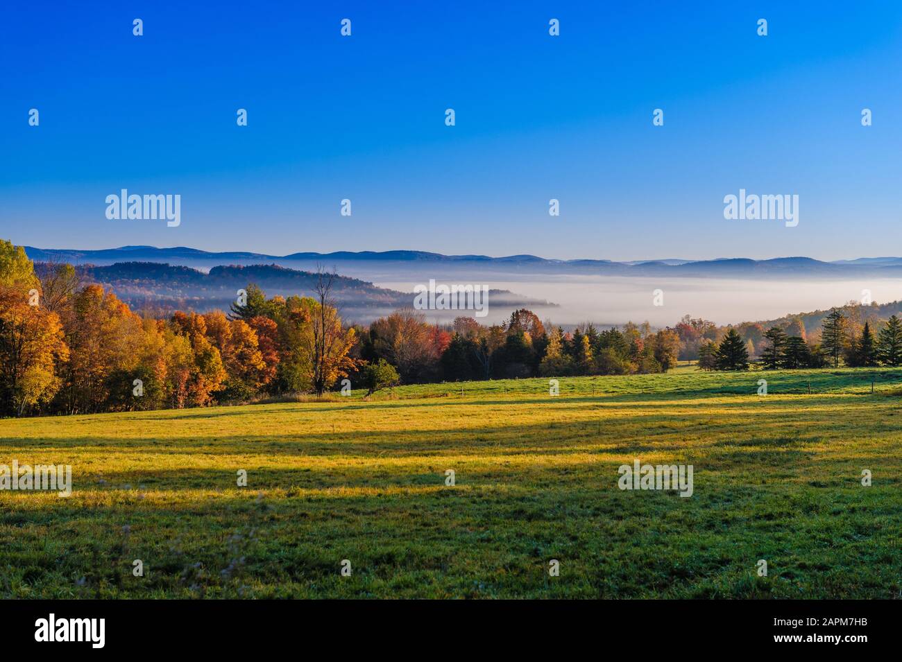 Morning sunrise during fall foliage season, Stowe, Vermont, USA Stock ...
